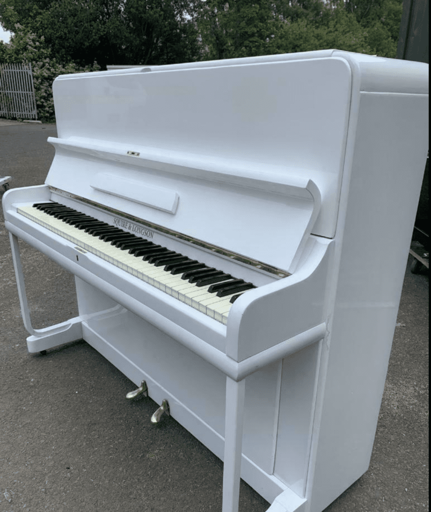 Small white Squire & Longson of London upright piano in gloss white finish